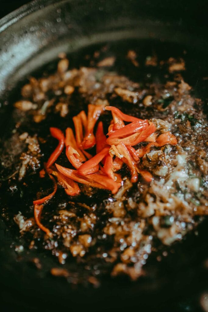 Thai spicy catfish stir fried with red curry paste - Simply Suwanee